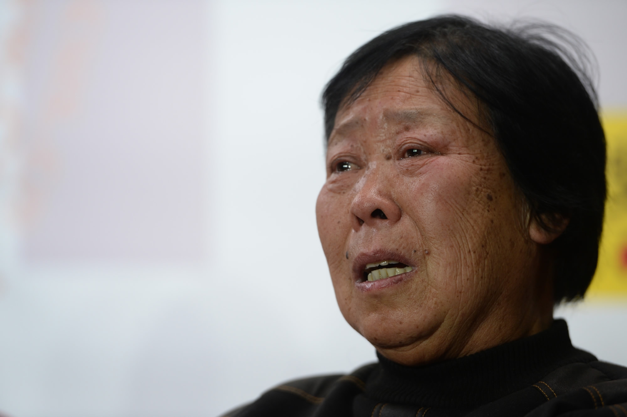Parents of Chinese man cleared 21 years after execution receive ...