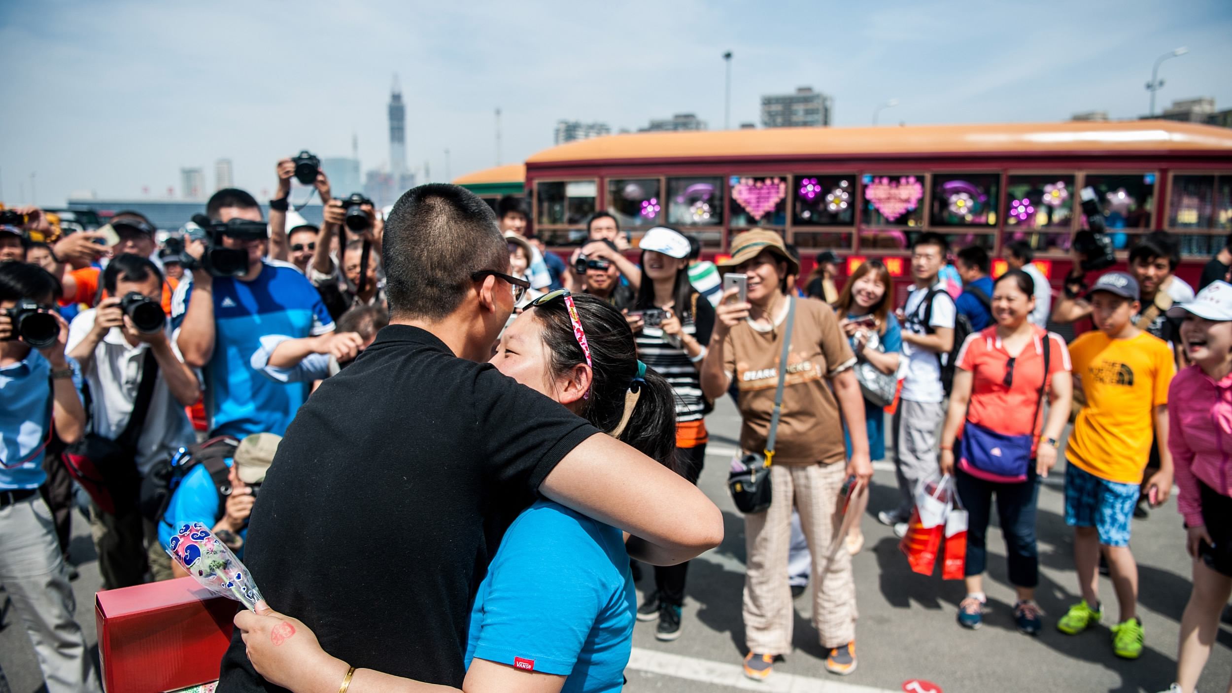 All aboard the love bus as young Beijinger proposes on retro vehicle - CGTN