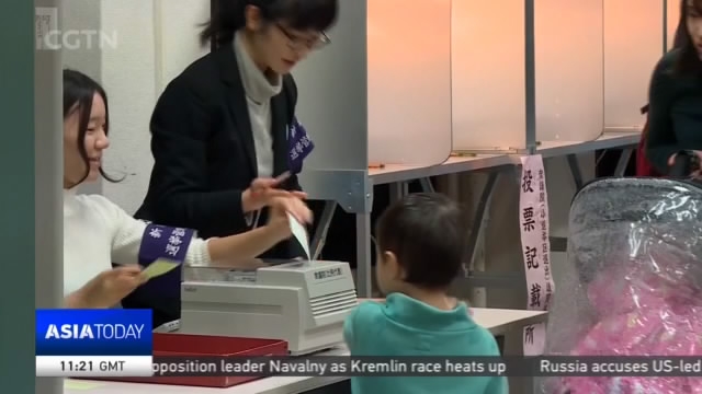 Japan General Election: Japanese voters cast ballots to elect new ...